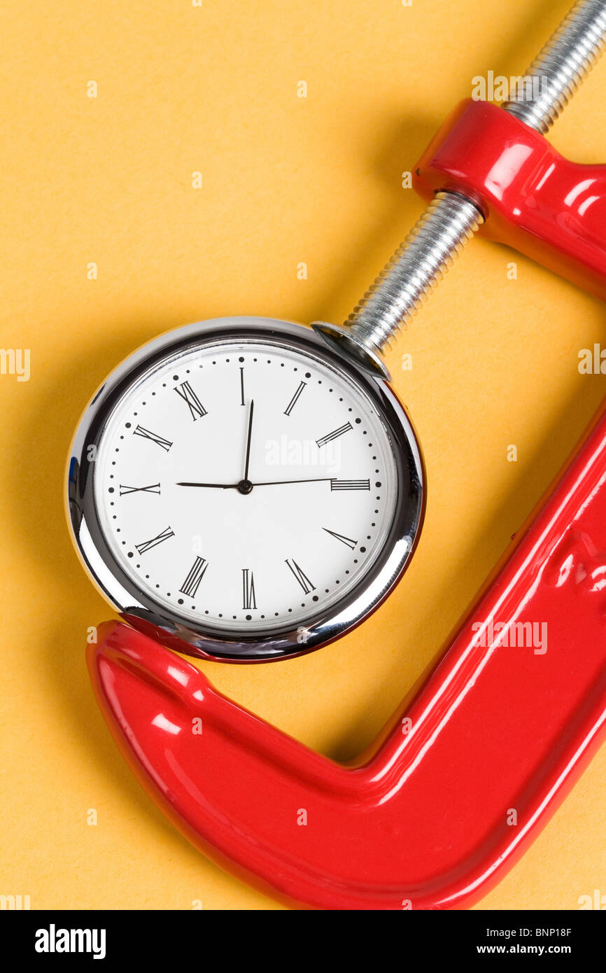 Vise Grip and Clock, Concept of busy Stock Photo - Alamy