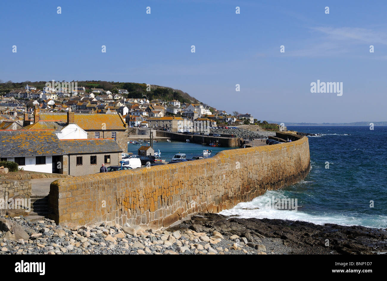 the sea wall protecting the harbour at mousehole in cornwall, uk Stock ...