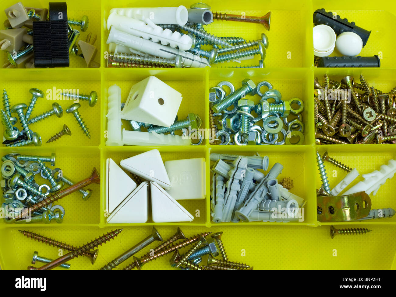 metal screw in yellow box Stock Photo - Alamy