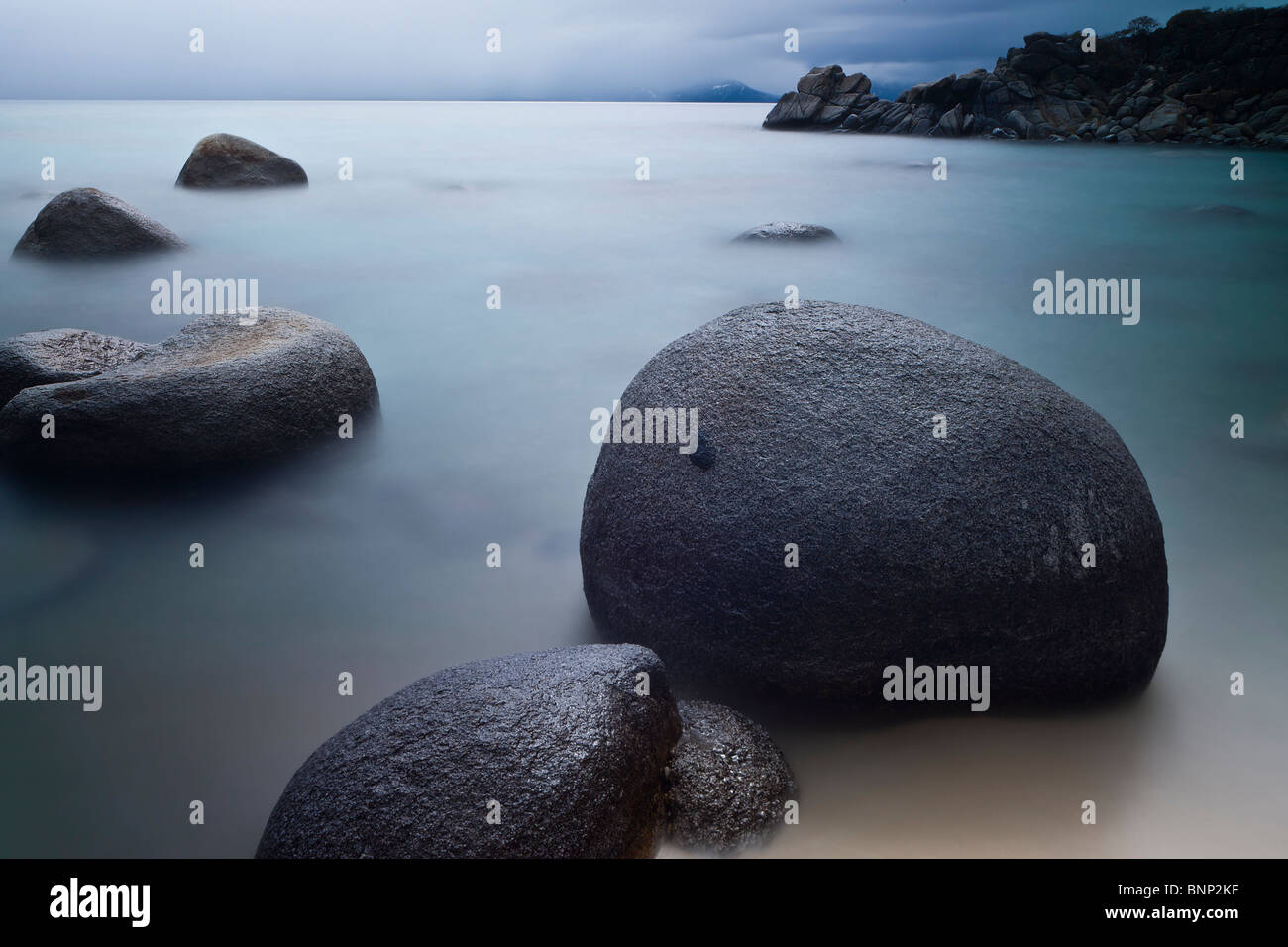 Boulders and still water at Hidden Beach, Lake Tahoe, Nevada, USA Stock ...