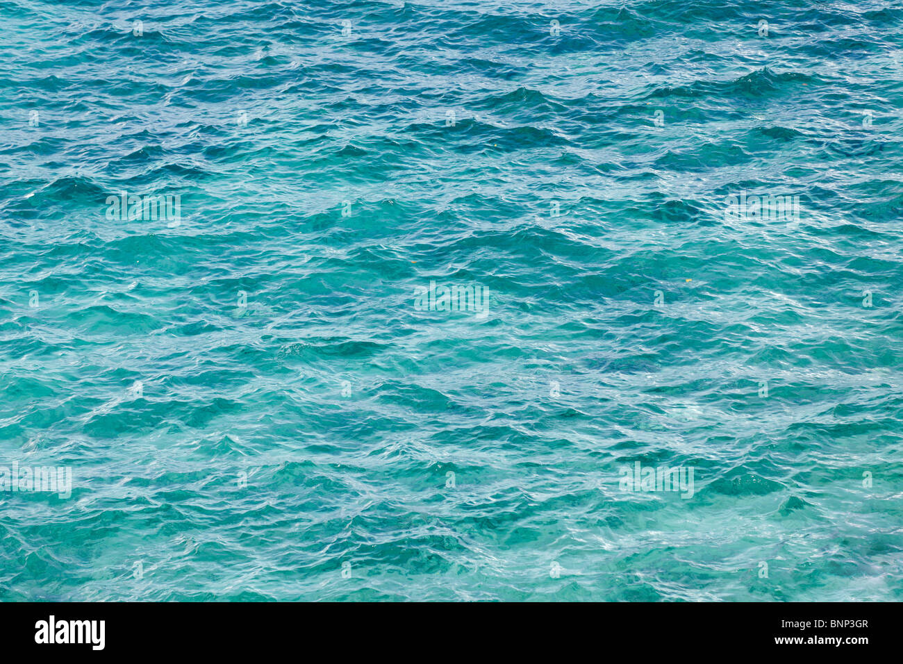turquoise tropical sea background with rain falling on surface Stock ...