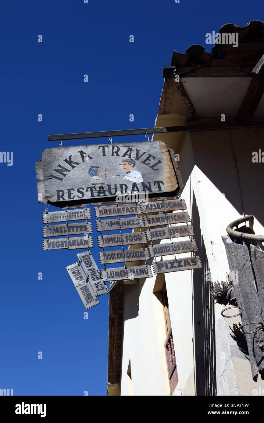 Rustic Inka Restaurant sign in village of Ollantaytambo , Sacred Valley ...