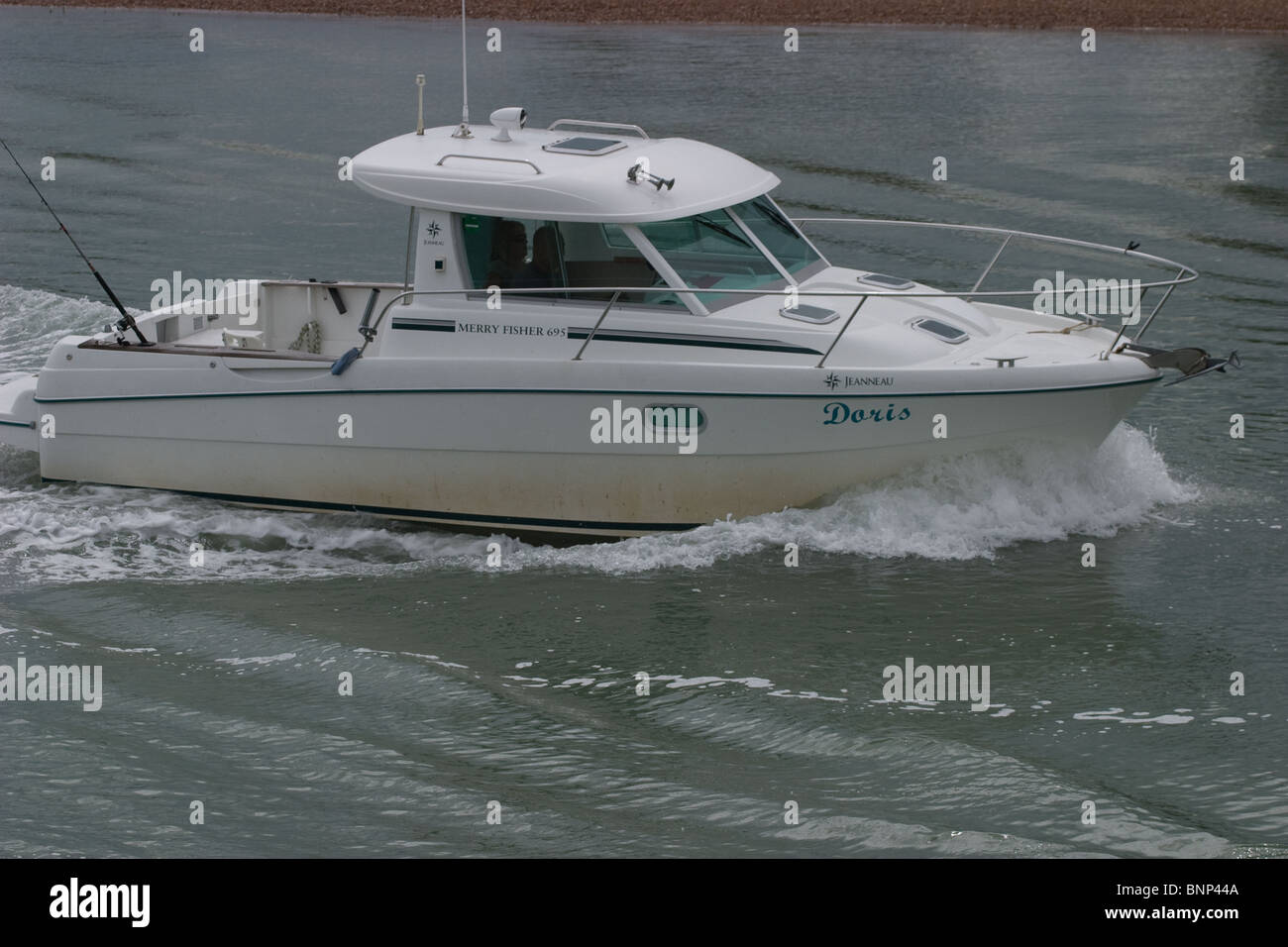 large motor powered leisure wooden boat old wood Stock Photo - Alamy