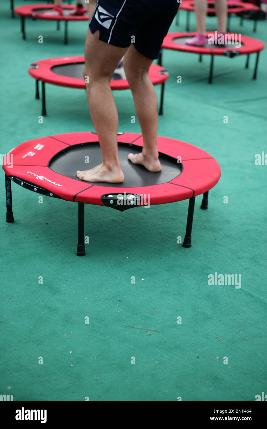 group of people at aerobics gym fitness class. legs jump jumping ...