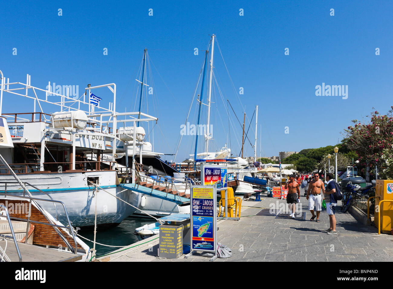 Boats along the promenade in Mandraki Harbour, Rhodes Town, Rhodes ...