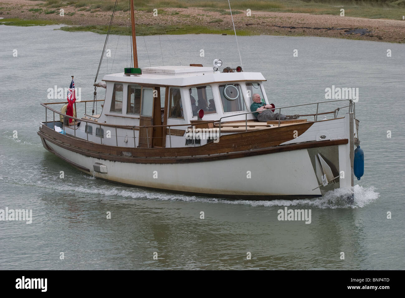 large motor powered leisure wooden boat old wood Stock Photo - Alamy