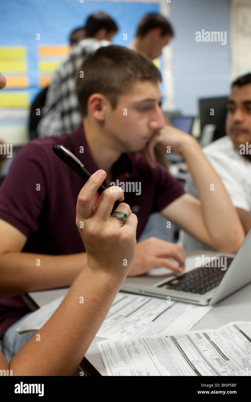 Student works on laptop computer during class at Manor New Tech High ...