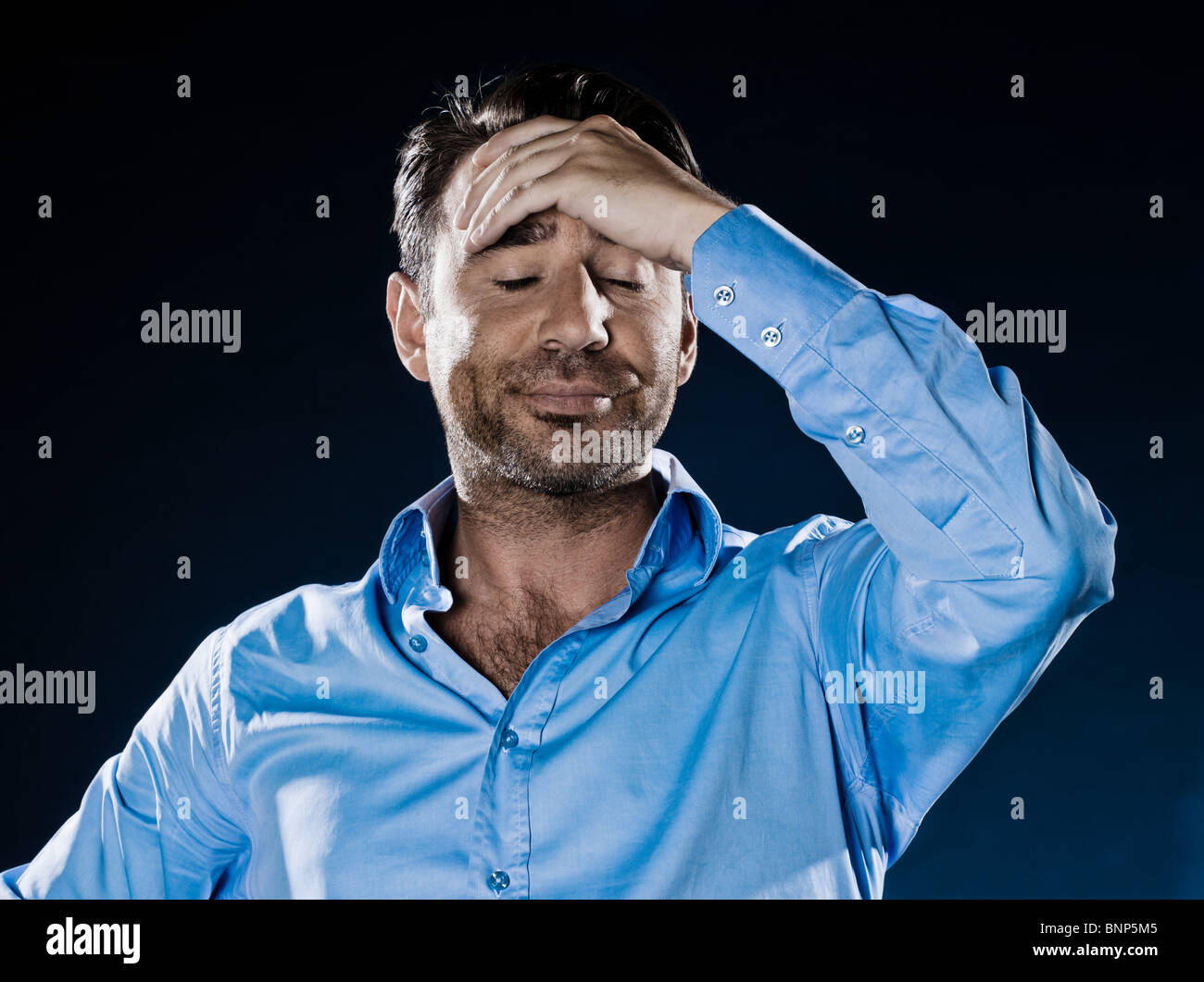 caucasian man distraught unshaven portrait isolated studio on black ...