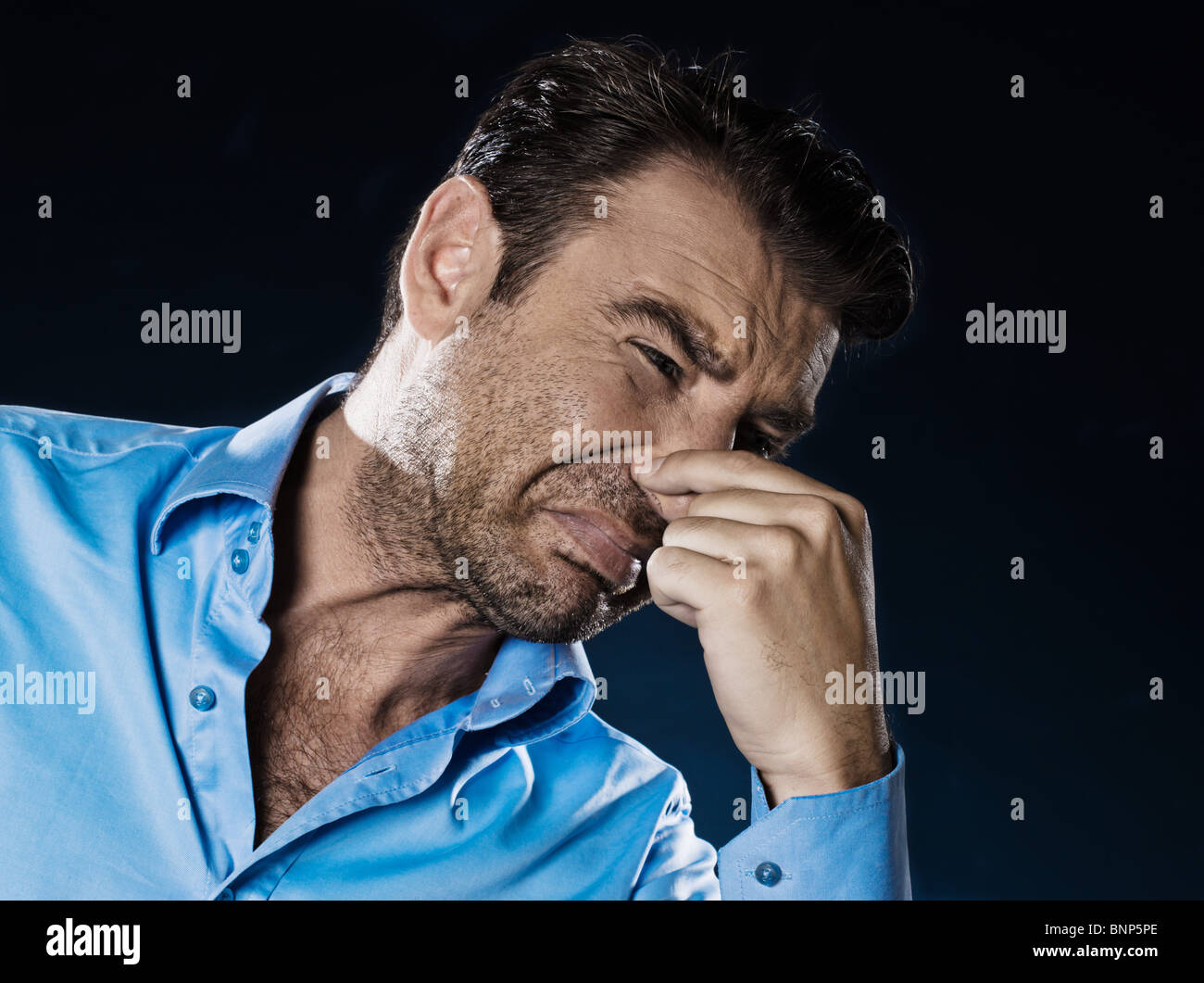 caucasian man unshaven pucker unpleasant smell portrait isolated studio ...