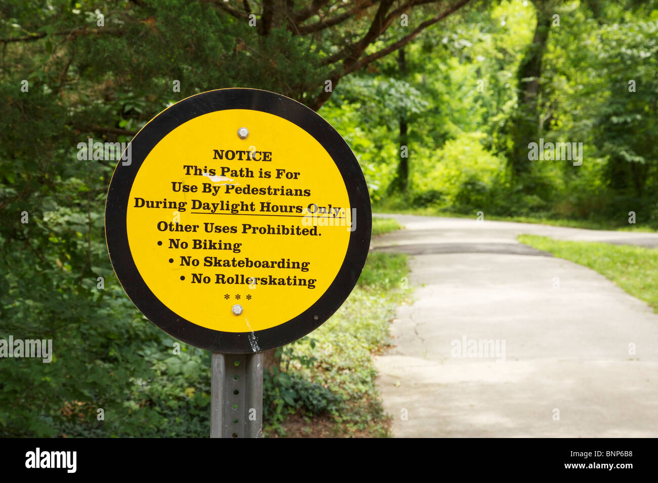 Daylight pedestrian use only sign on path. Southern Illinois University ...