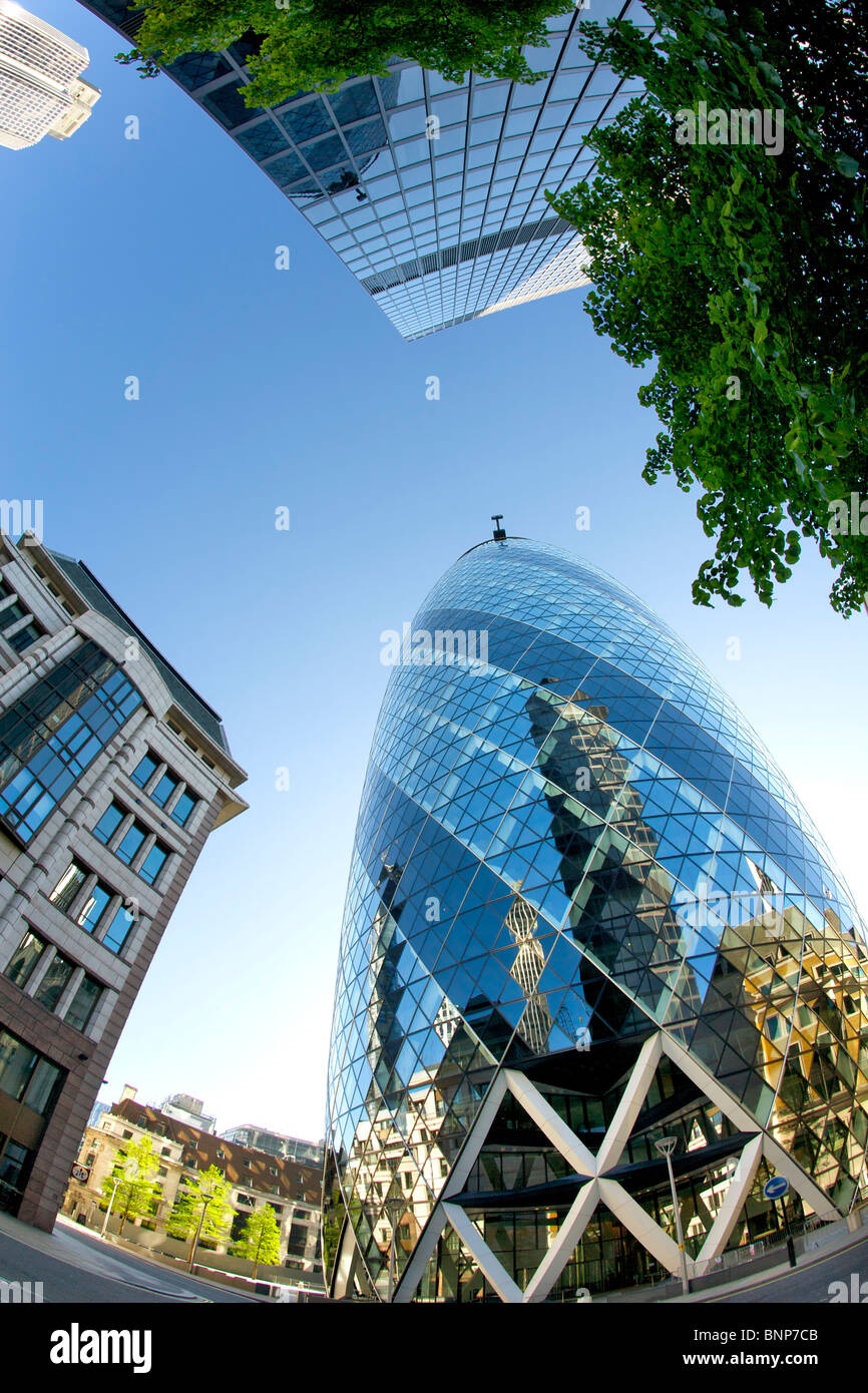 30 St Mary Axe (aka the gherkin) and surrounding buildings in the ...