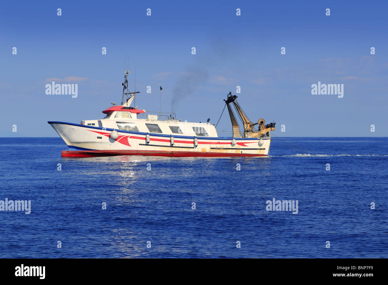 trawler fisher boat boat working in mediterranean offshore blue water ...