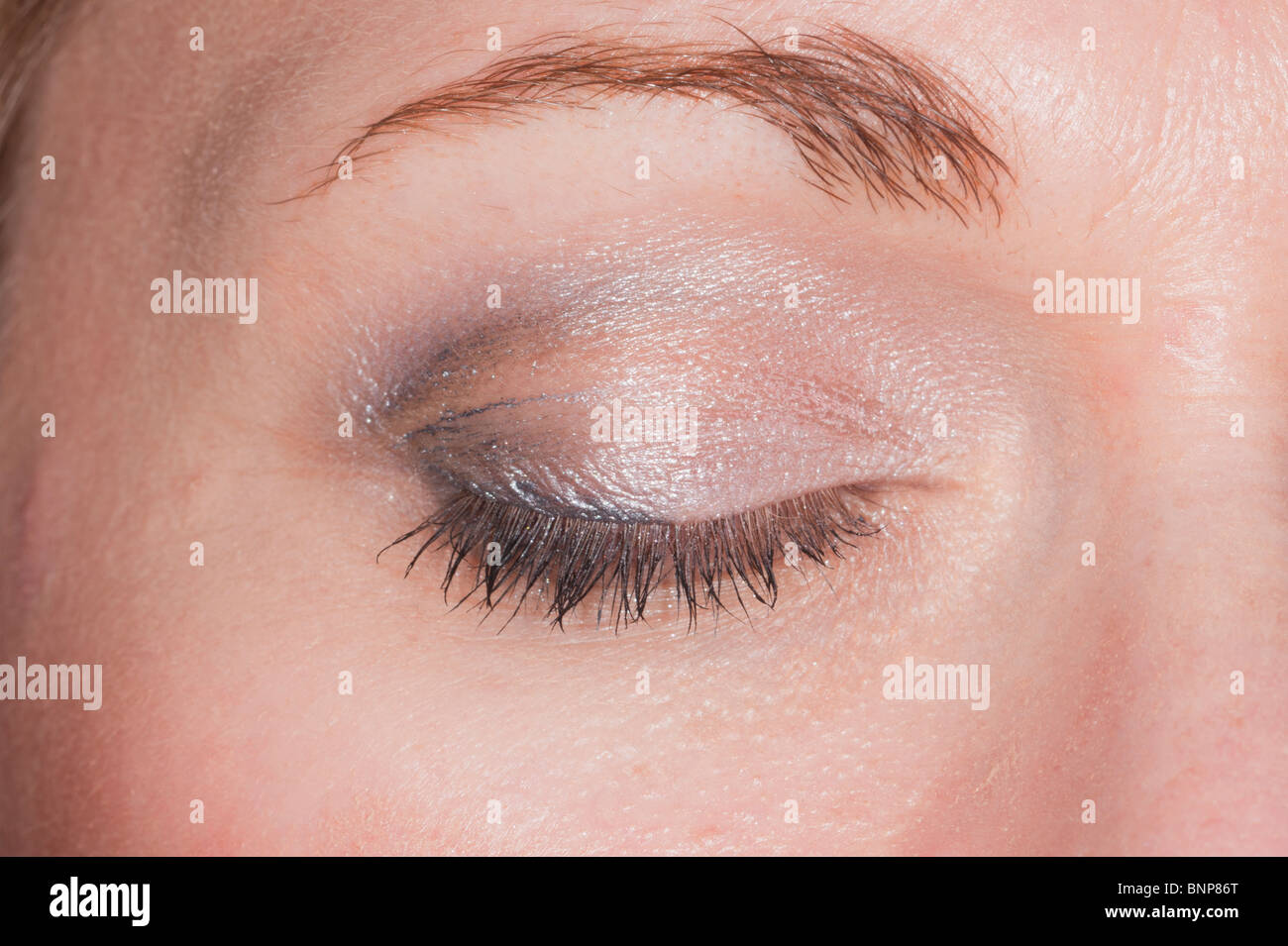 A MODEL RELEASED close up picture of a womans closed eye Stock Photo ...