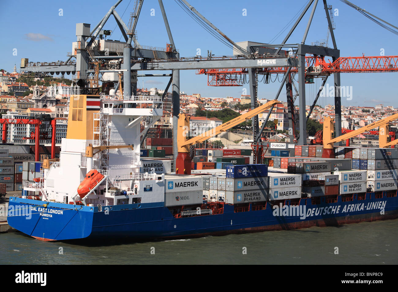 The Container ship "Dal East London" busily discharging cargo at the ...