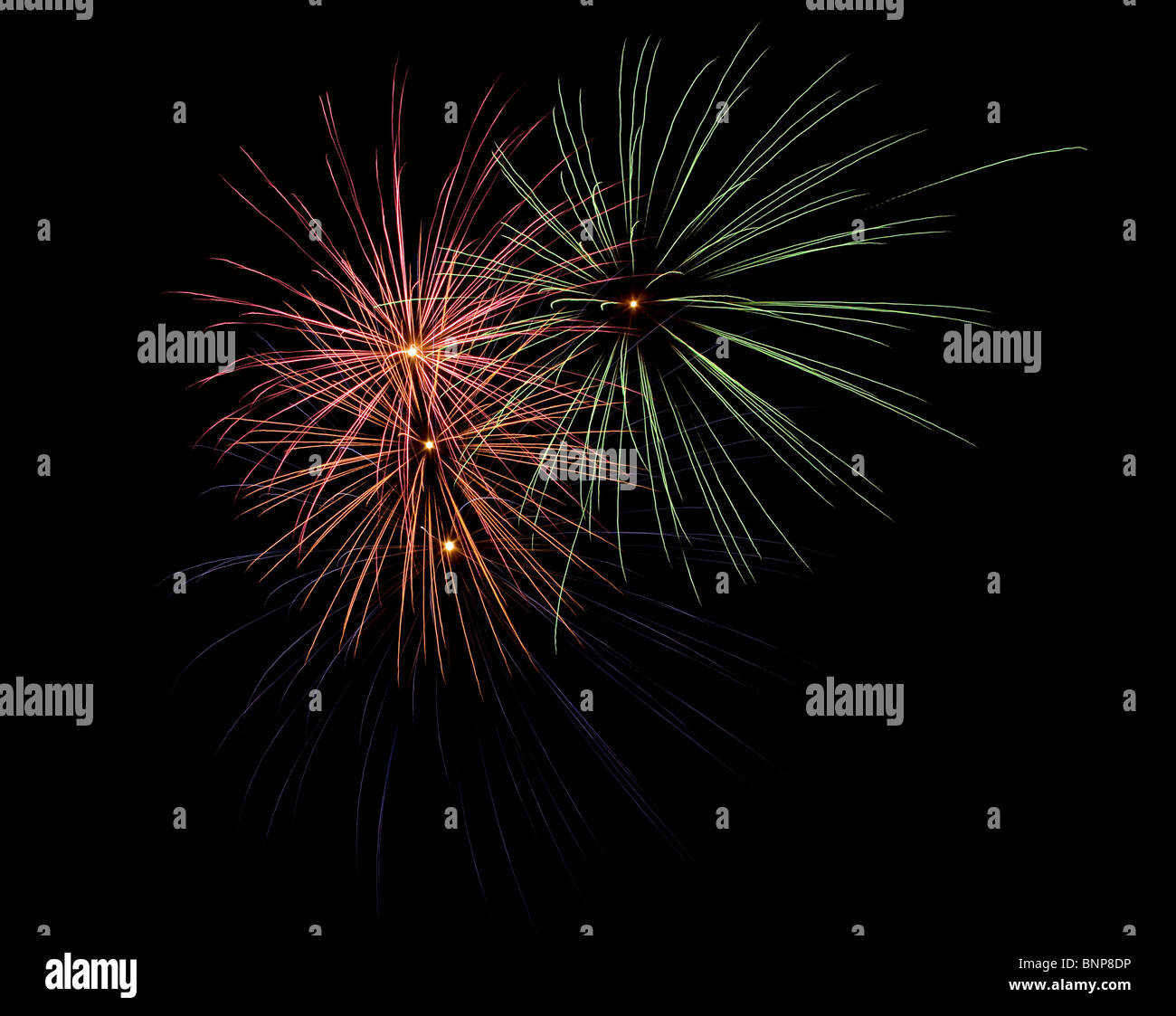 Fireworks exploding in a night sky Stock Photo - Alamy