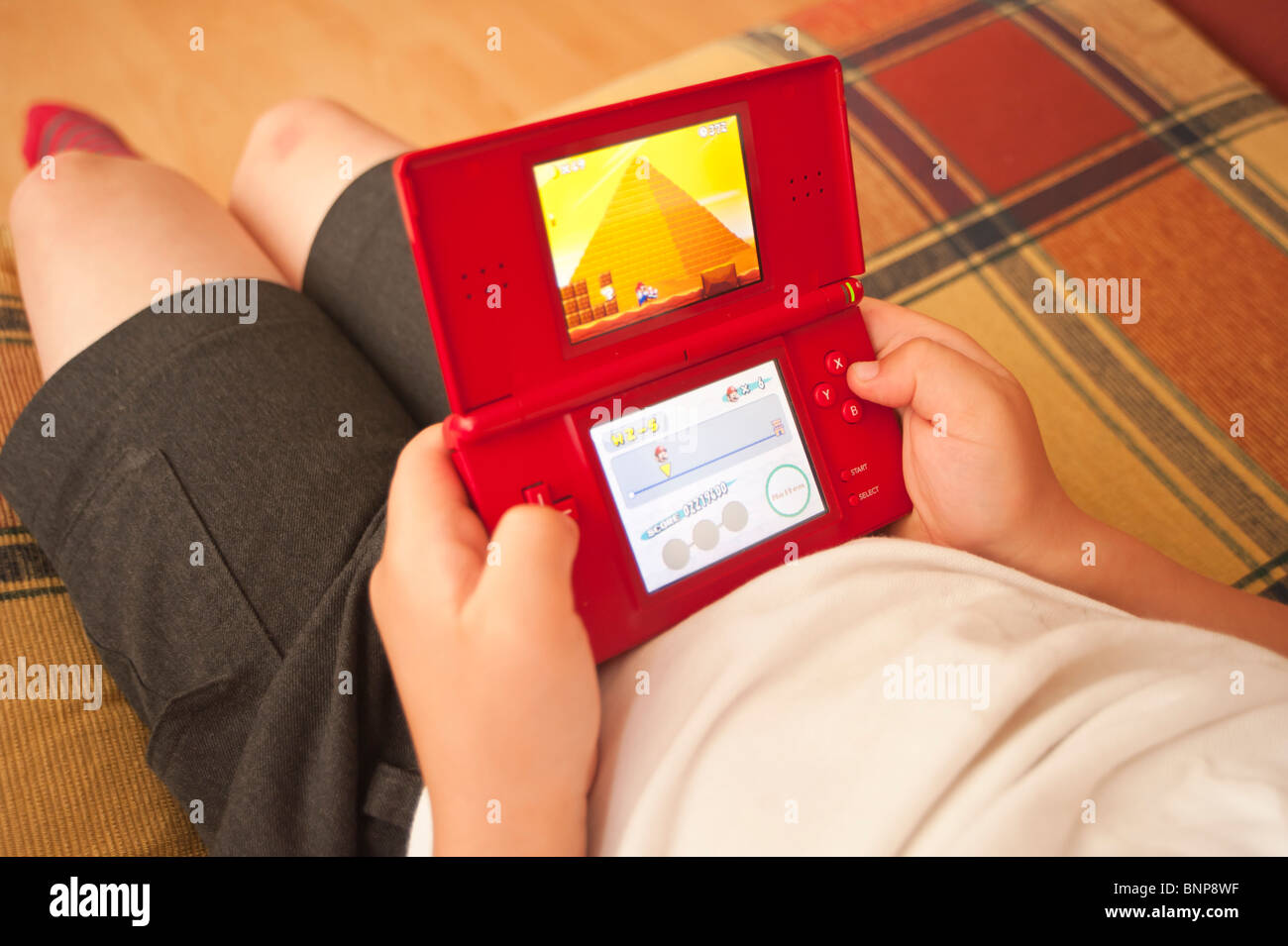 A MODEL RELEASED close up picture of a six year old boy playing on a ...