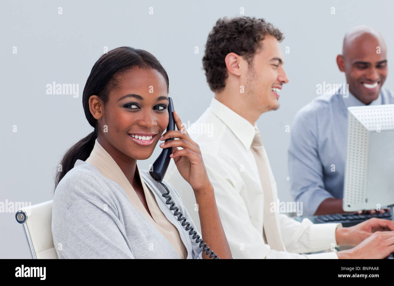 Successful business group working hard in the office Stock Photo - Alamy