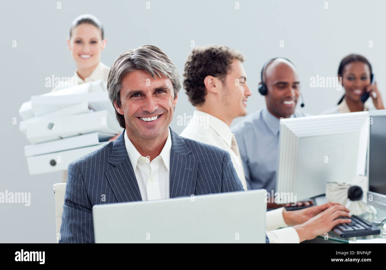 Presentation of an ambitious business team working hard Stock Photo - Alamy