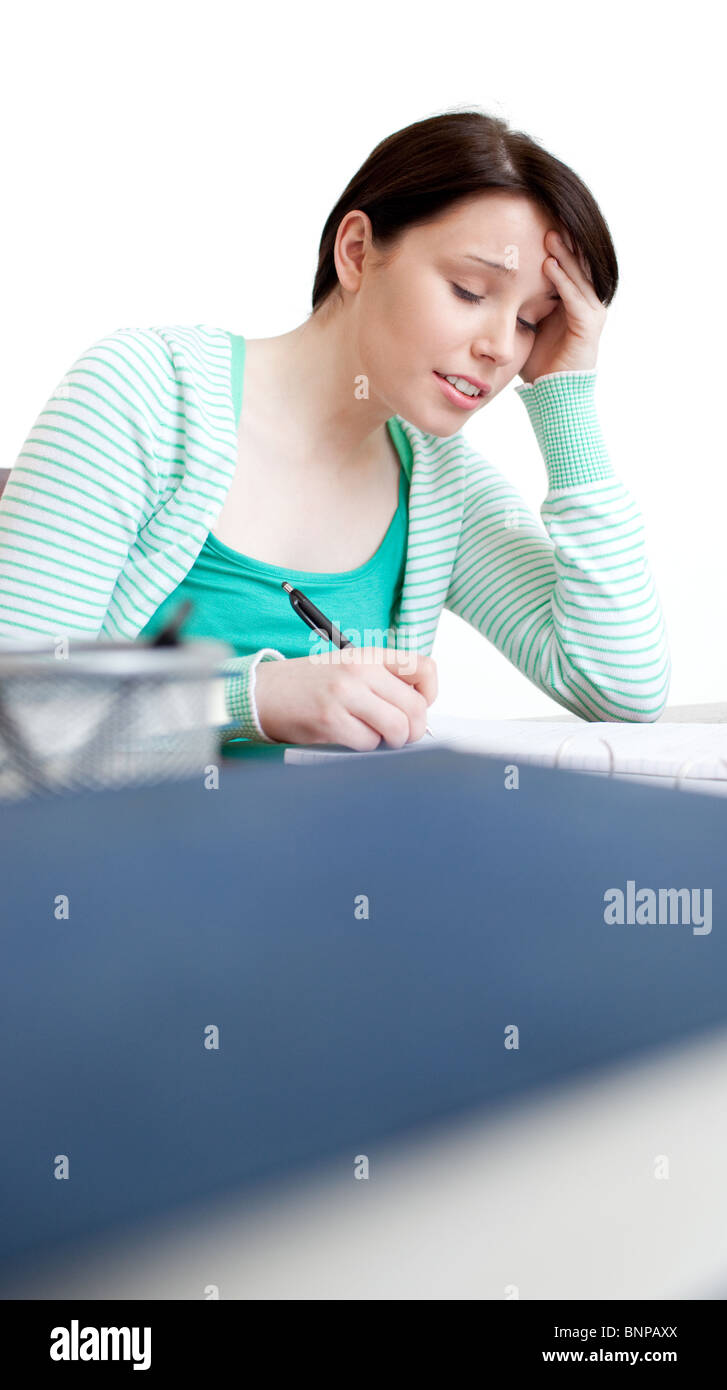 Exhausted student doing her homework Stock Photo - Alamy