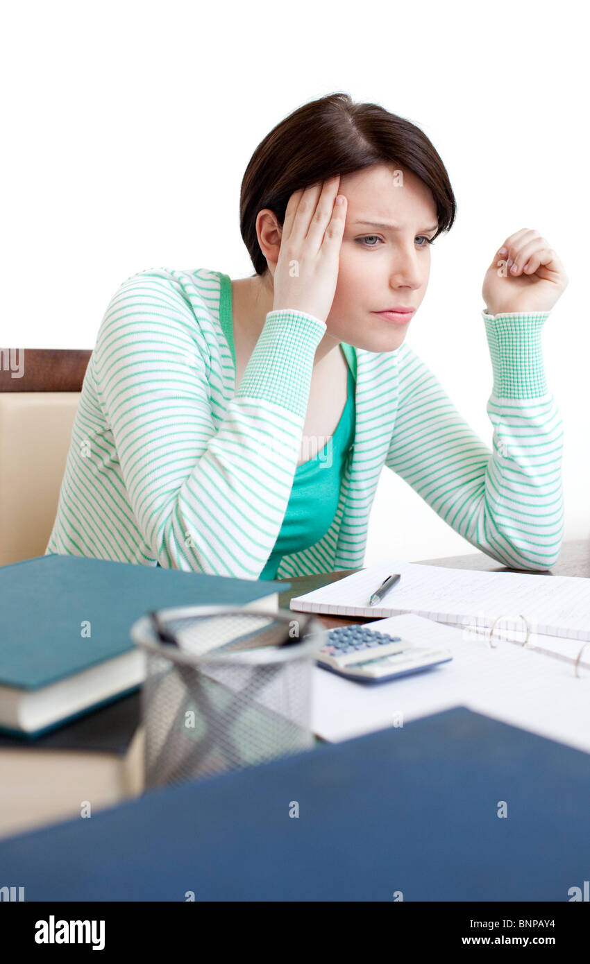 Depressed student doing her homework Stock Photo - Alamy
