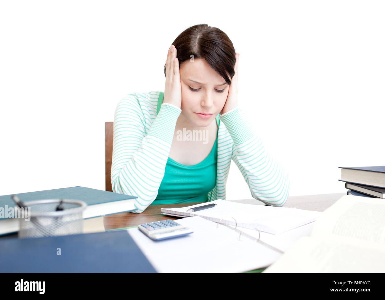 Stressed student doing her homework Stock Photo - Alamy