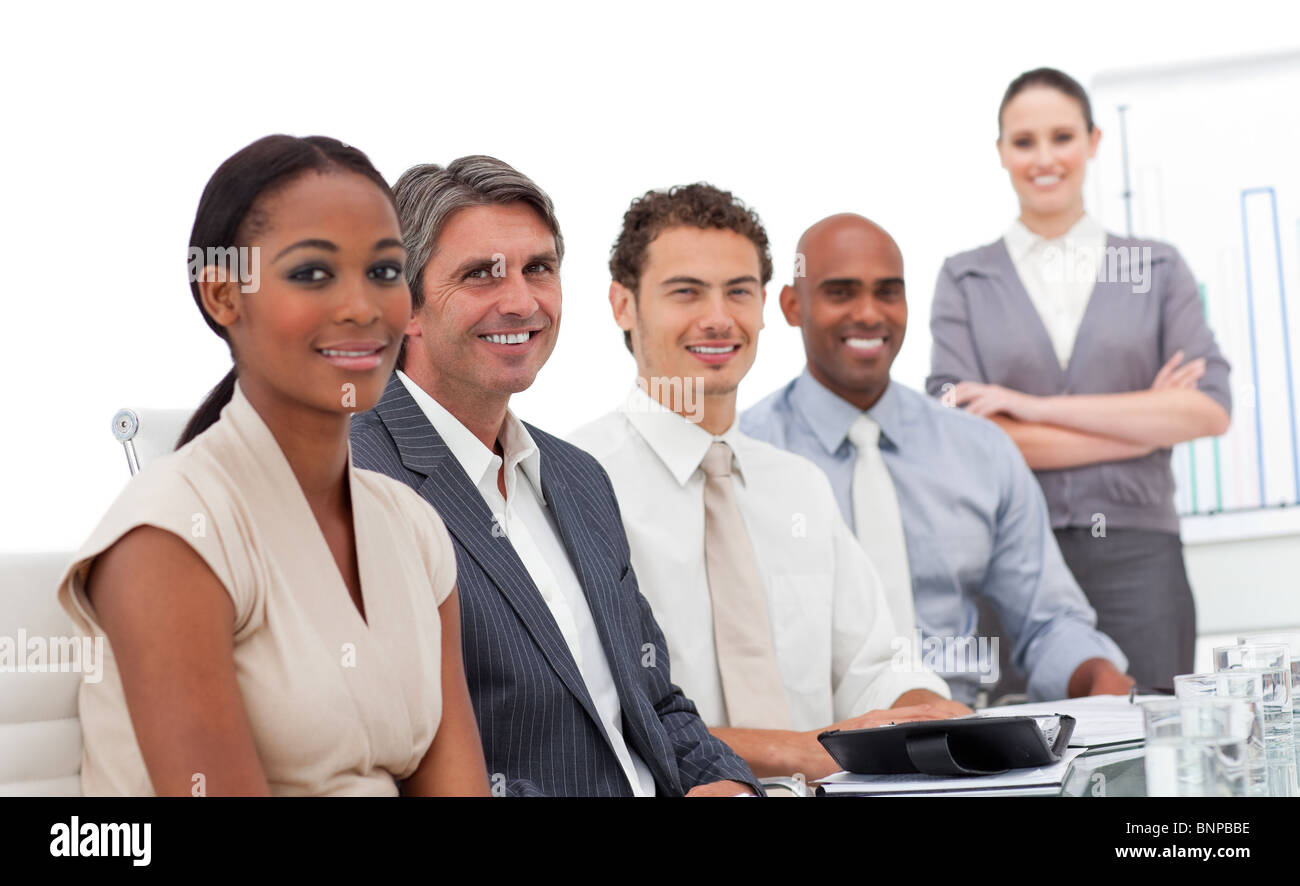 Business team smiling at the camera Stock Photo - Alamy