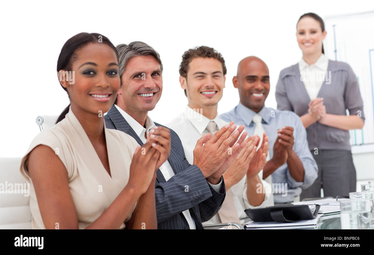 Positive business team applauding a good presentation Stock Photo - Alamy