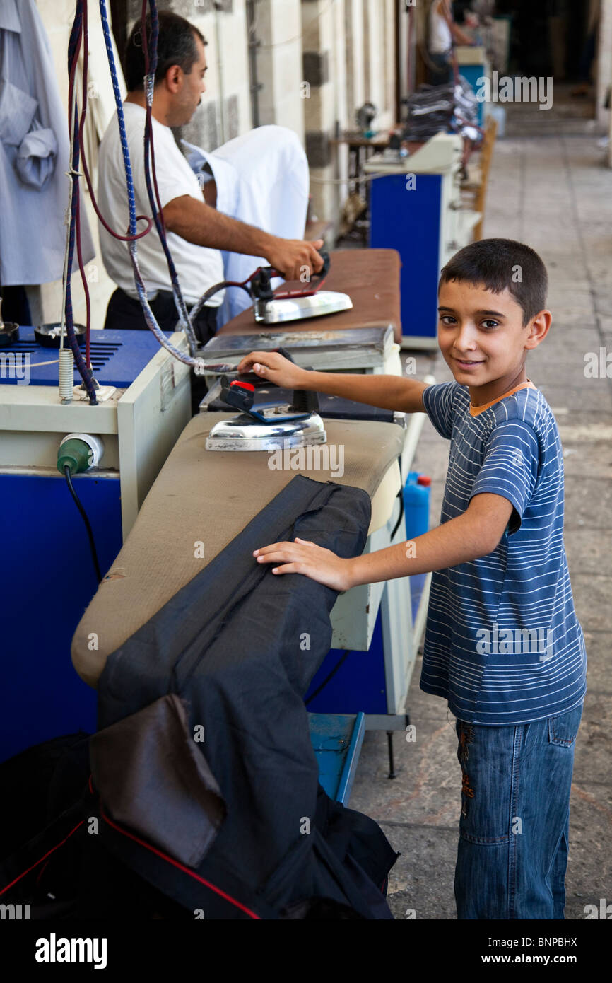 Child labour textile hi-res stock photography and images - Alamy