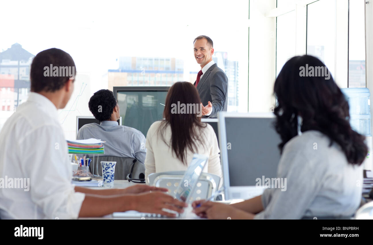 Male manager explaining a business project Stock Photo - Alamy