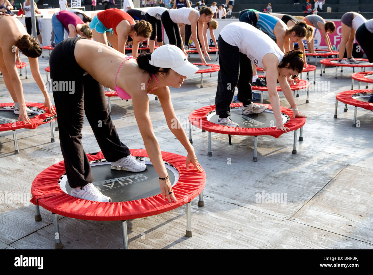 group of people at aerobics gym fitness class. legs jump jumping ...