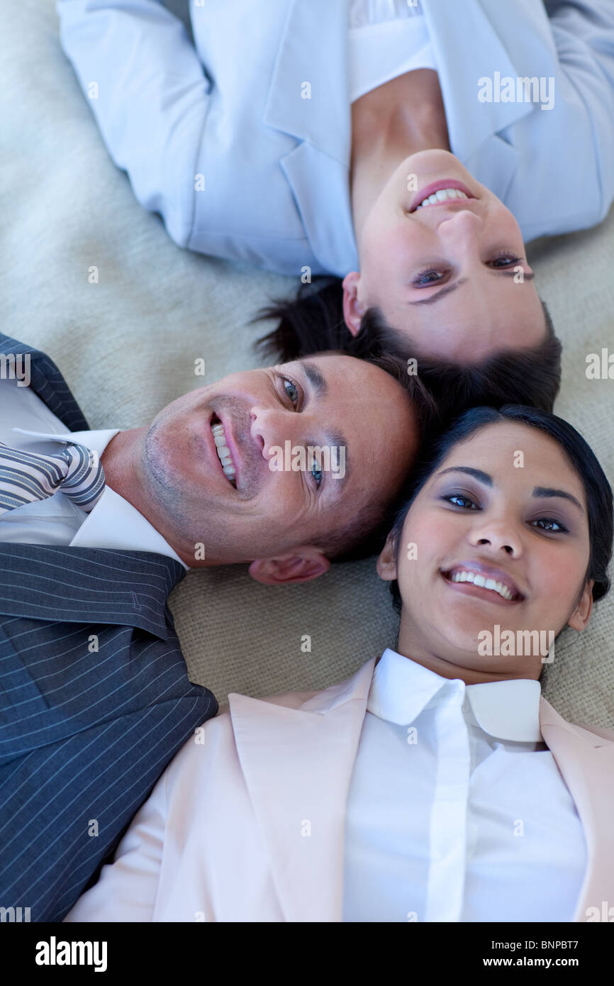 Heads together professional hi-res stock photography and images - Alamy