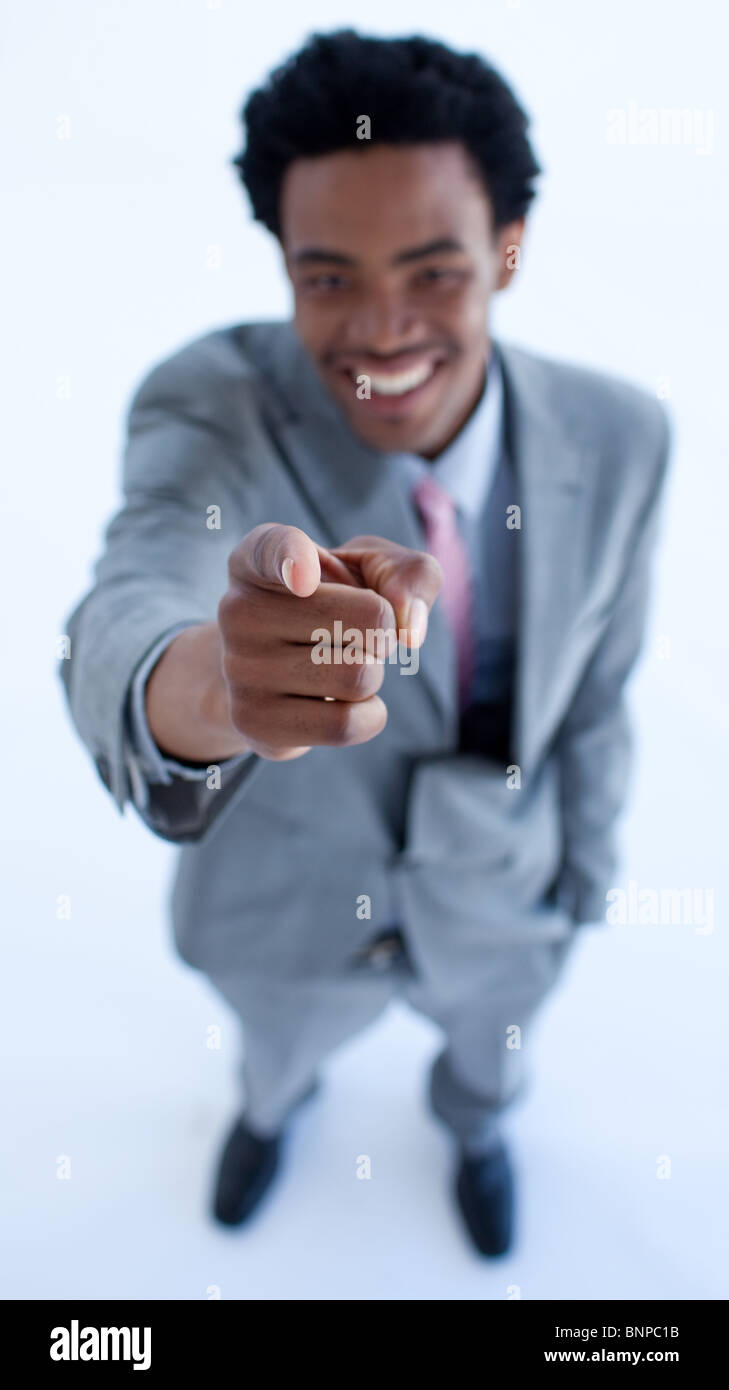 Smiling businessman pointing at the camera Stock Photo - Alamy