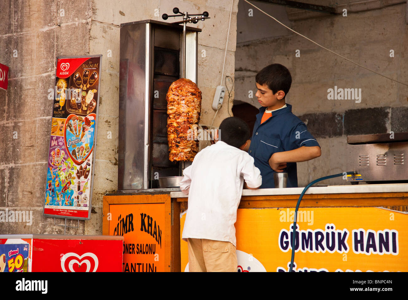 Boy cooking doner in Gumrek Caravanserai in Sanliurfa, Turkey Stock ...