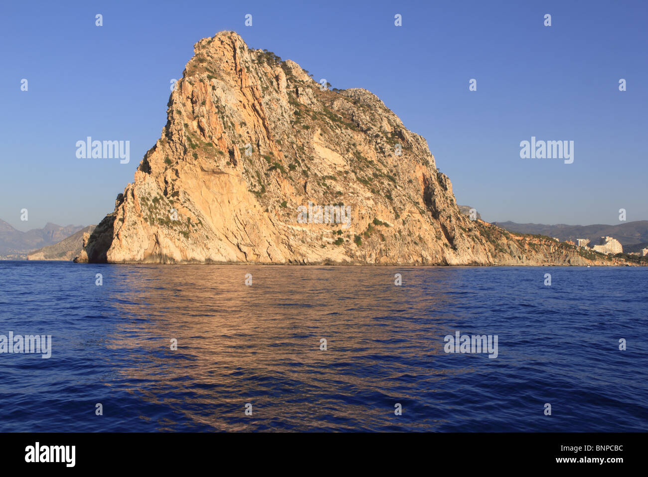 Ifach Penon mountain in Calpe from blue sea in Alicante province Spain ...