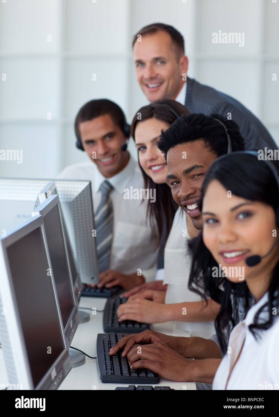 Business team and manager working in a call center Stock Photo - Alamy