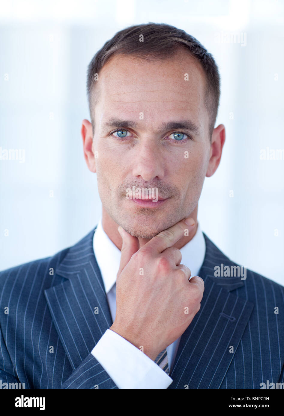 Portrait of a confident attractive businessman Stock Photo - Alamy