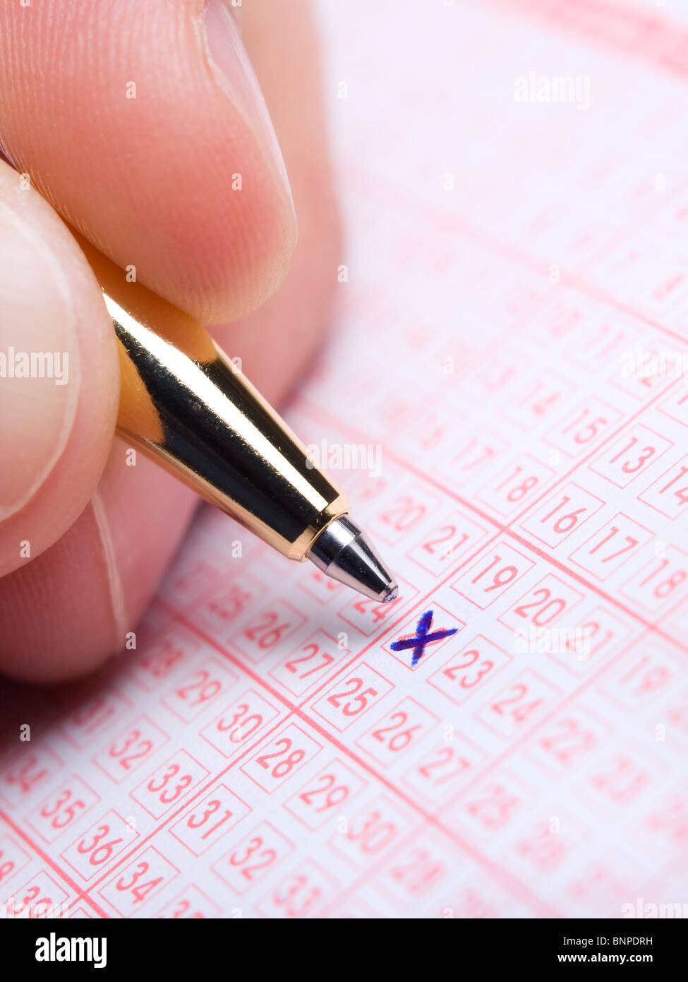 Closeup of lotto slip during the marking of numbers Stock Photo - Alamy