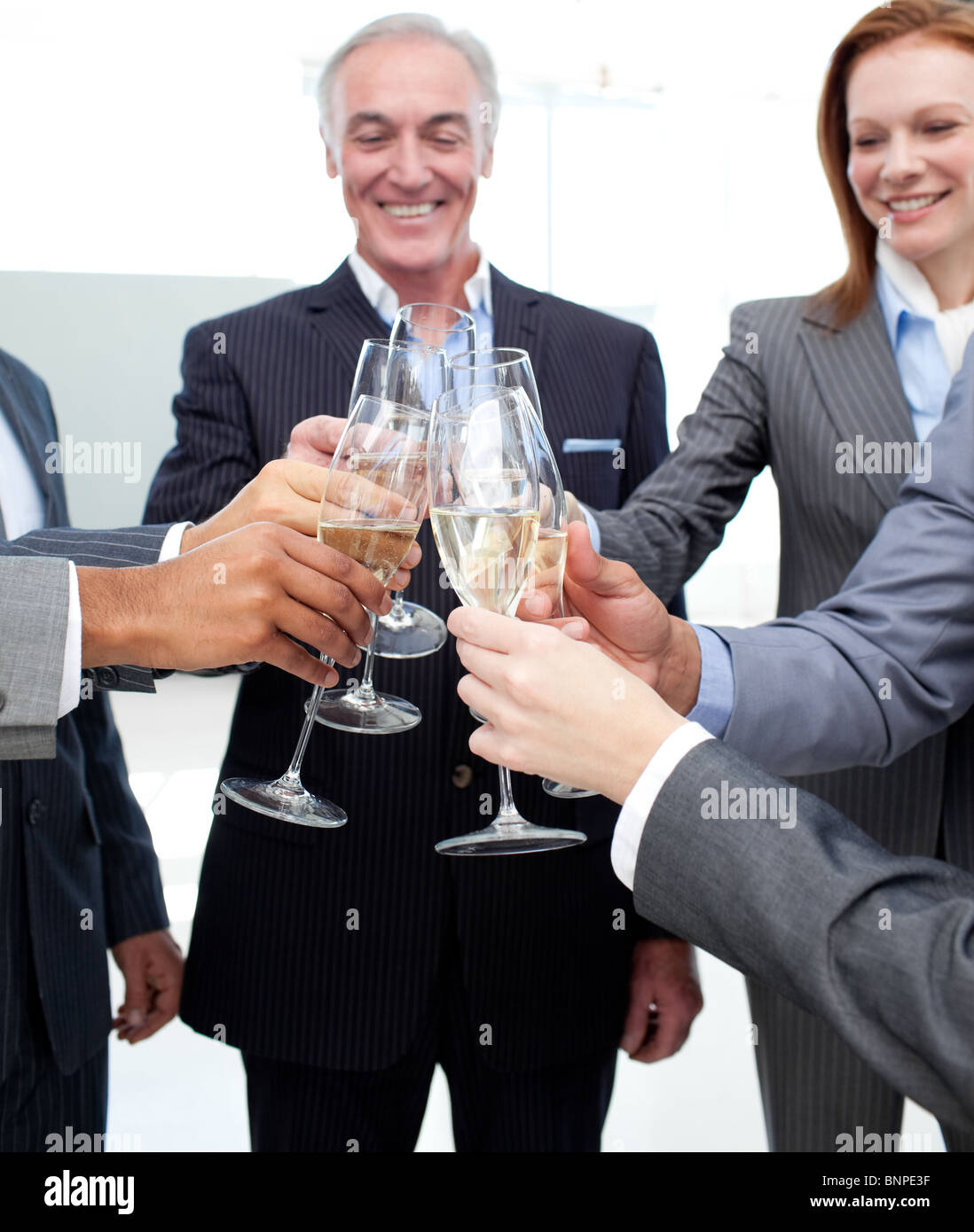 Cheerful business team celebrating a success Stock Photo - Alamy