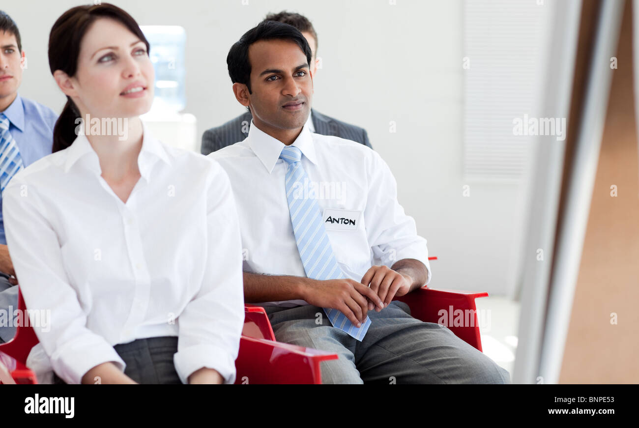 Concentrated business people at a conference Stock Photo - Alamy