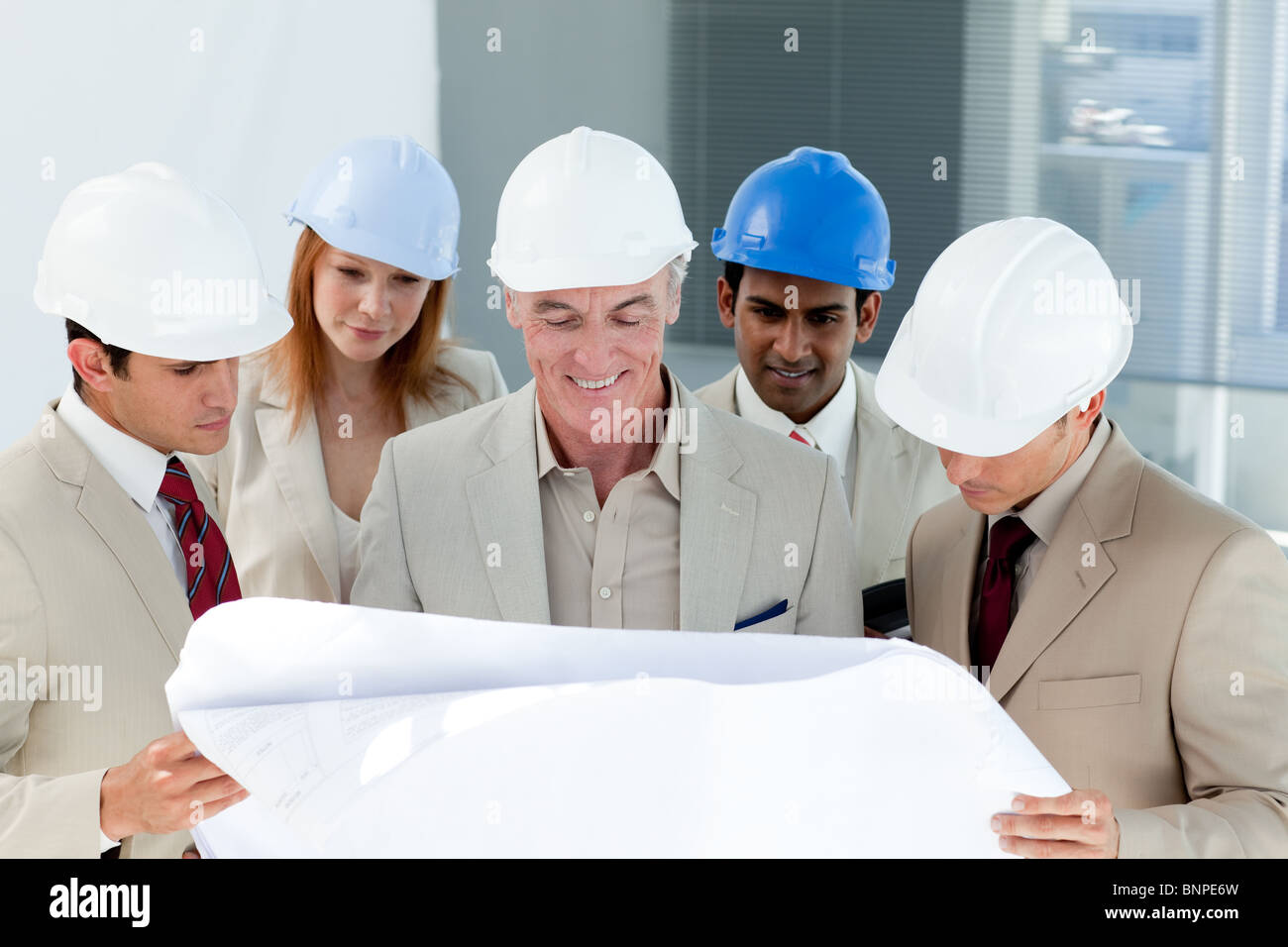 A group of architect discussing a project Stock Photo - Alamy