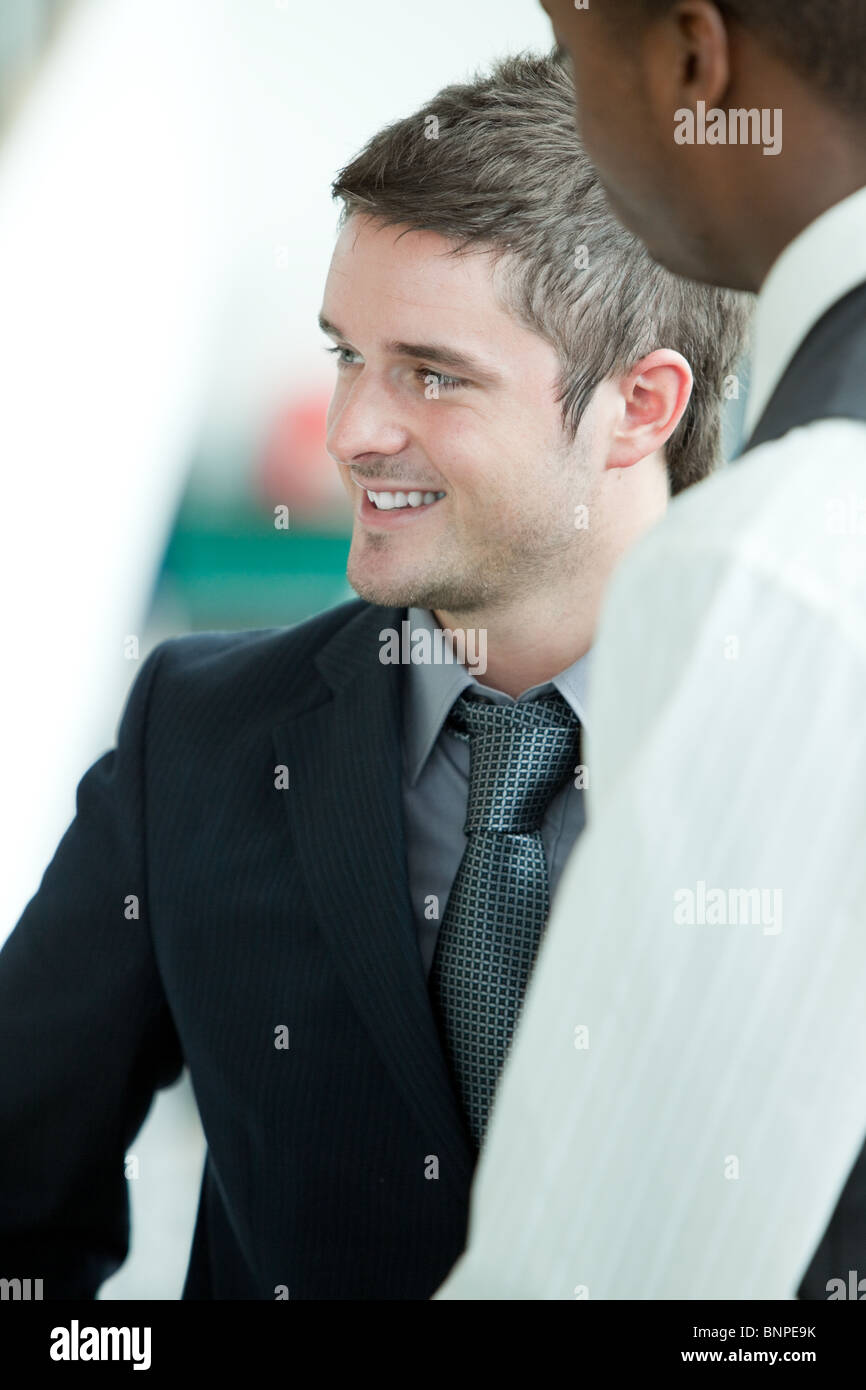 Business men talking Stock Photo - Alamy