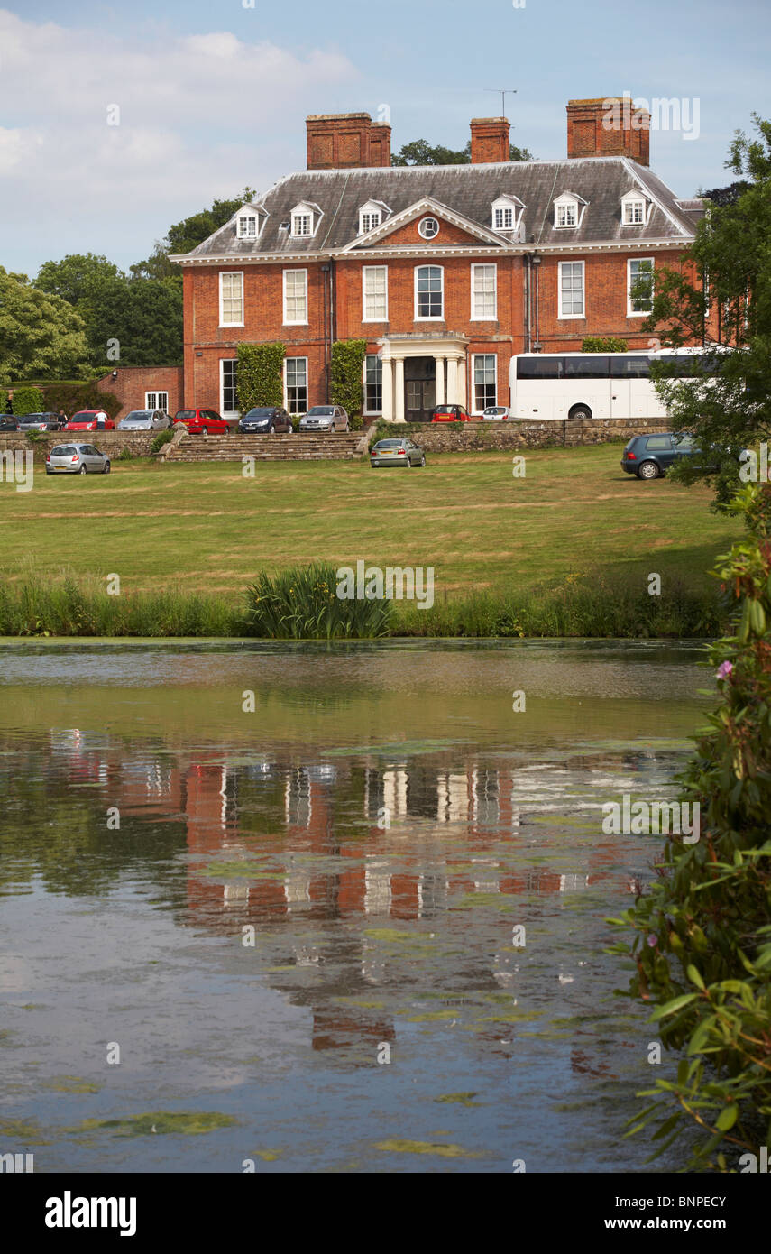 Squerryes Court house with reflections in lake - front view Stock Photo ...