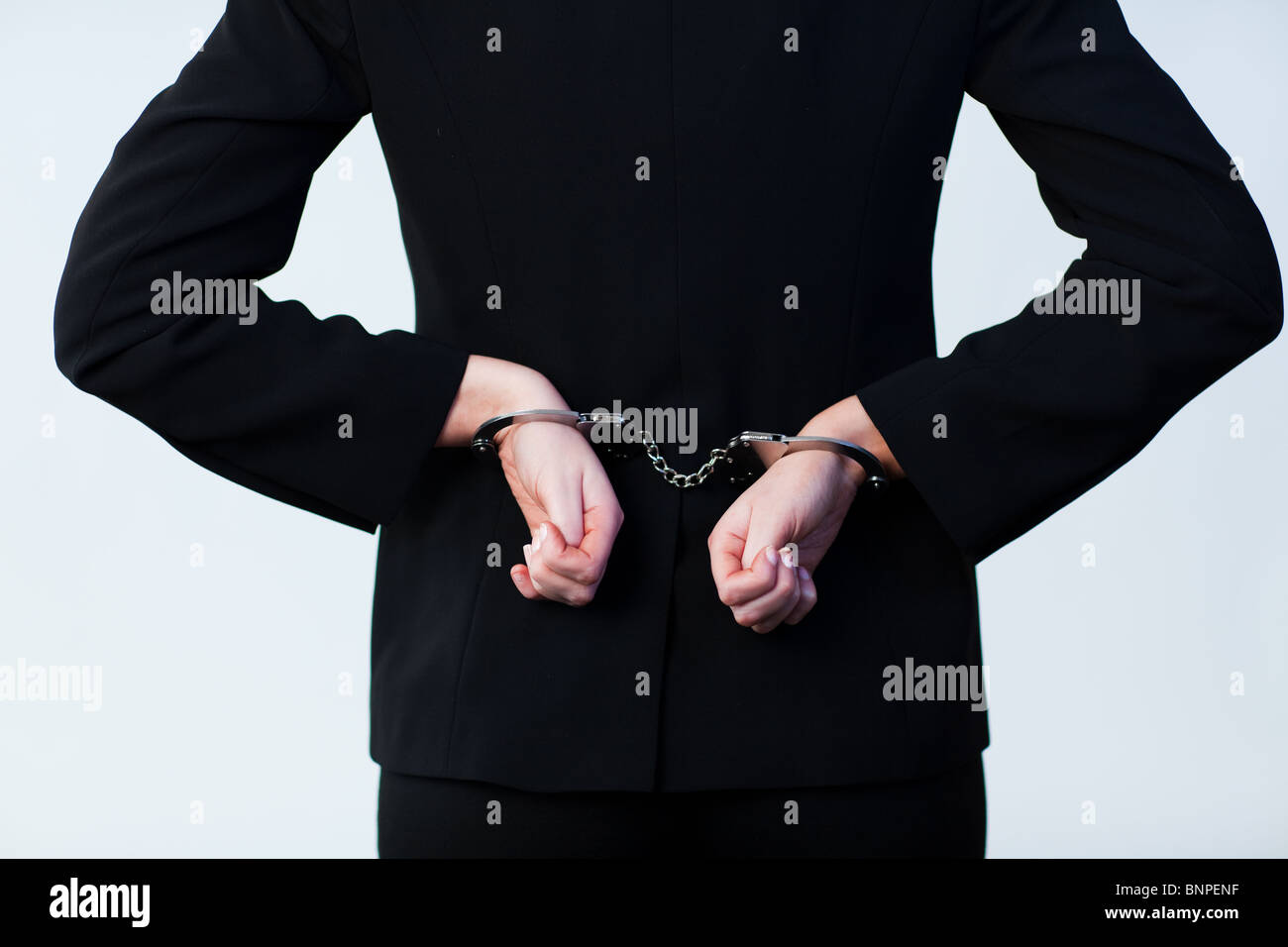 Female handcuffed police hi-res stock photography and images - Alamy