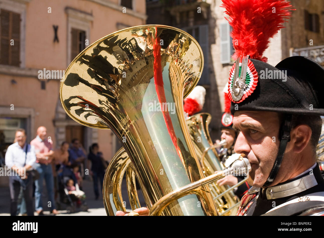 soldier in ceremonial uniform playing tuba in band Stock Photo - Alamy