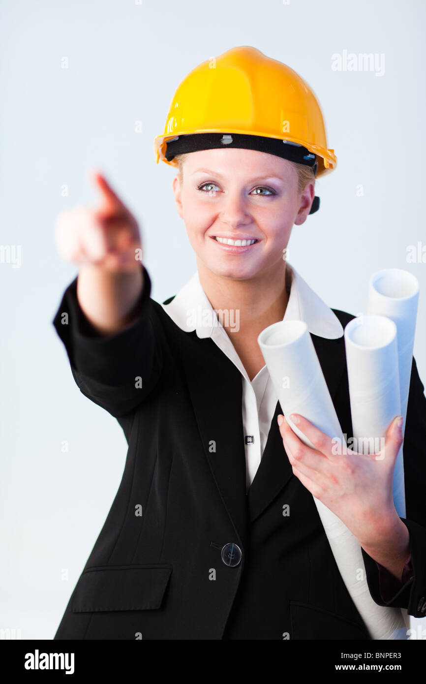 Female Construction worker pointing Stock Photo - Alamy