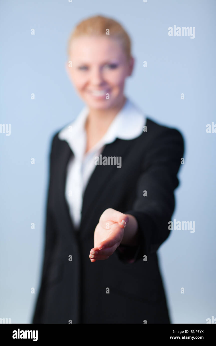 Woman offering a handshake Stock Photo - Alamy