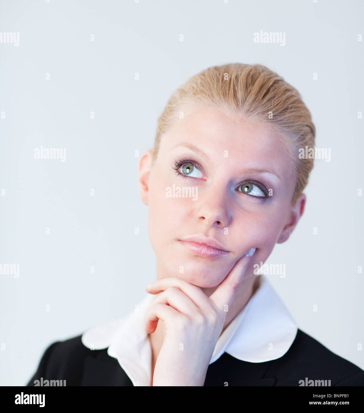 Happy Business woman looking upwards Stock Photo - Alamy