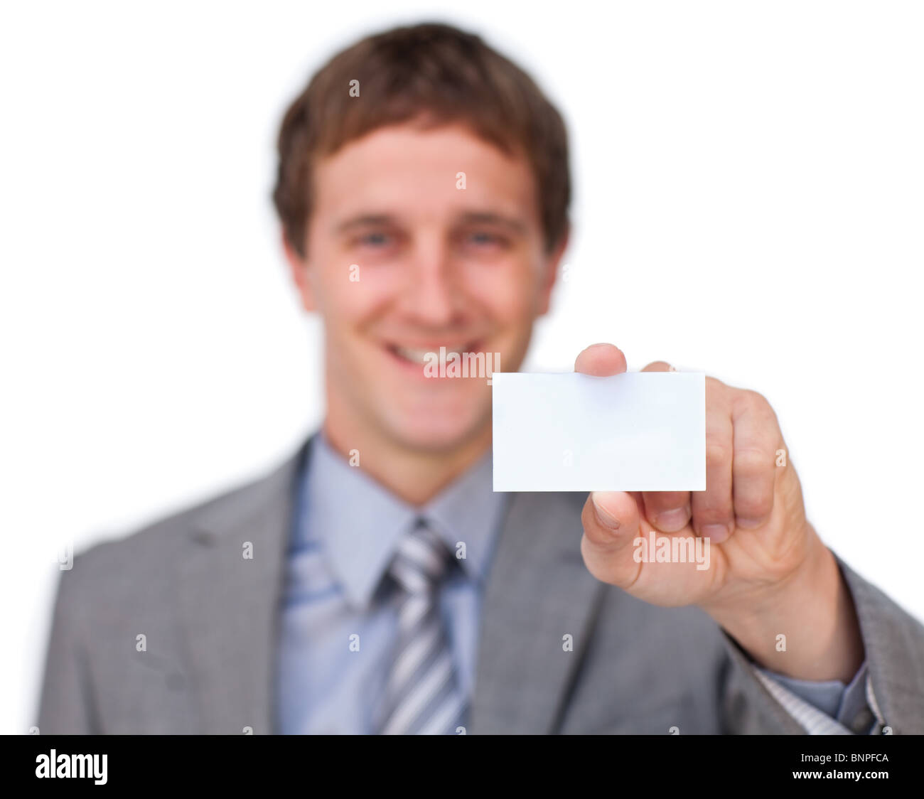 Charming businessman holding a white card Stock Photo - Alamy