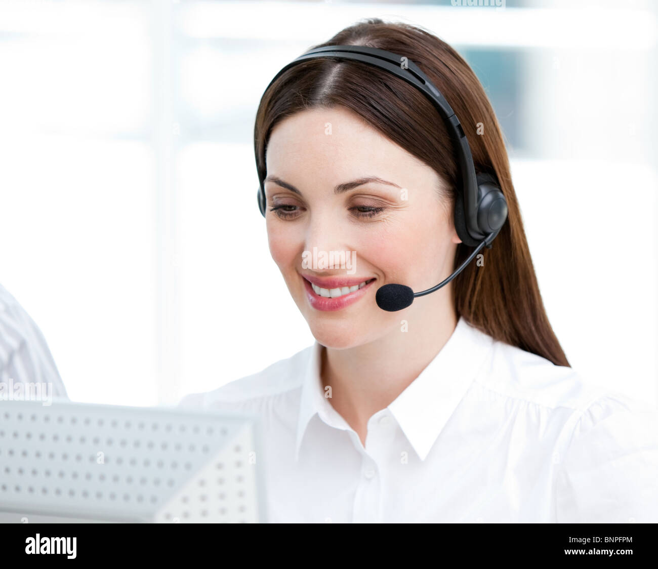 Portrait of a charming customer agent at work Stock Photo - Alamy