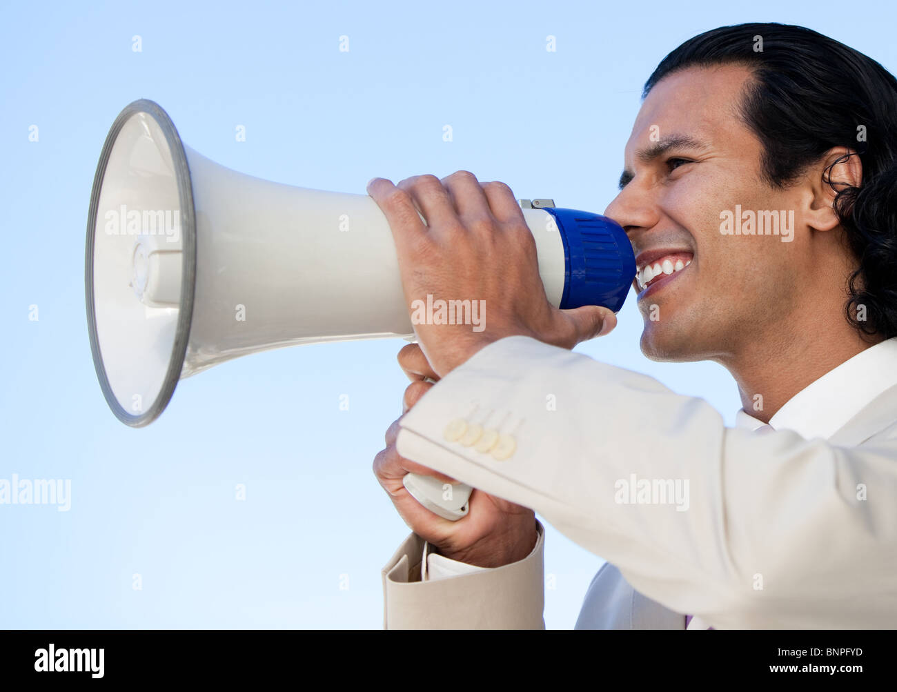 Portrait of an business man shouting through a megaphone Stock Photo ...